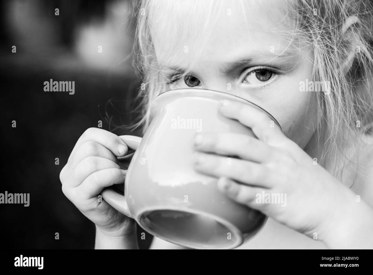 Break for drink. Girl drinking something. Water. Happy childhood. Child ...