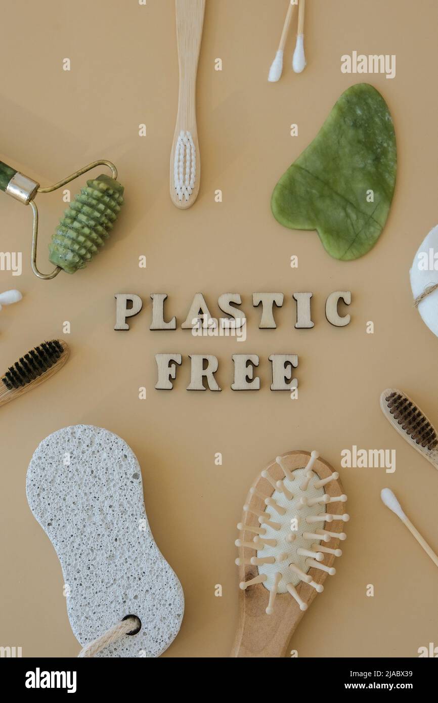 PLASTIC FREE text around Natural skin care products on neutral beige ...