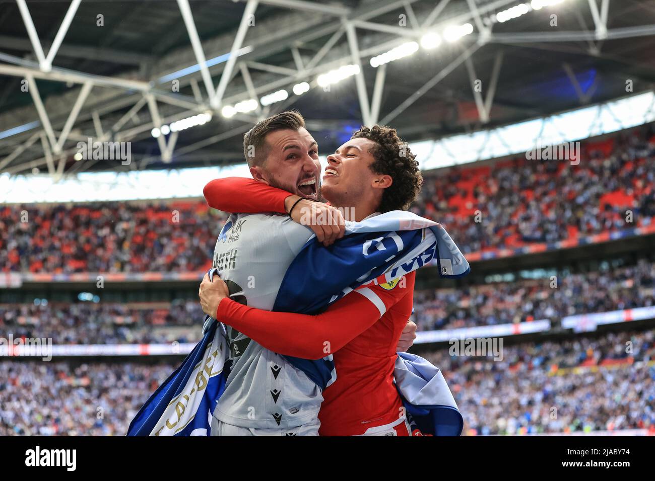 Jordan Smith #12 of Nottingham Forest celebrates promotion with Brennan ...
