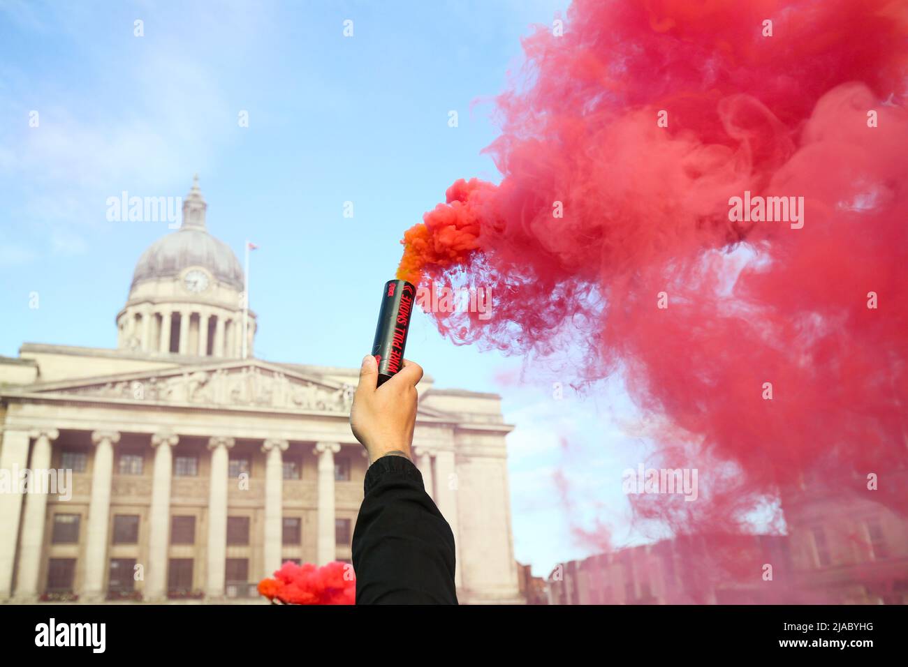 Nottingham Forest fans set off a red pyrotechnic in Old Market Square ...