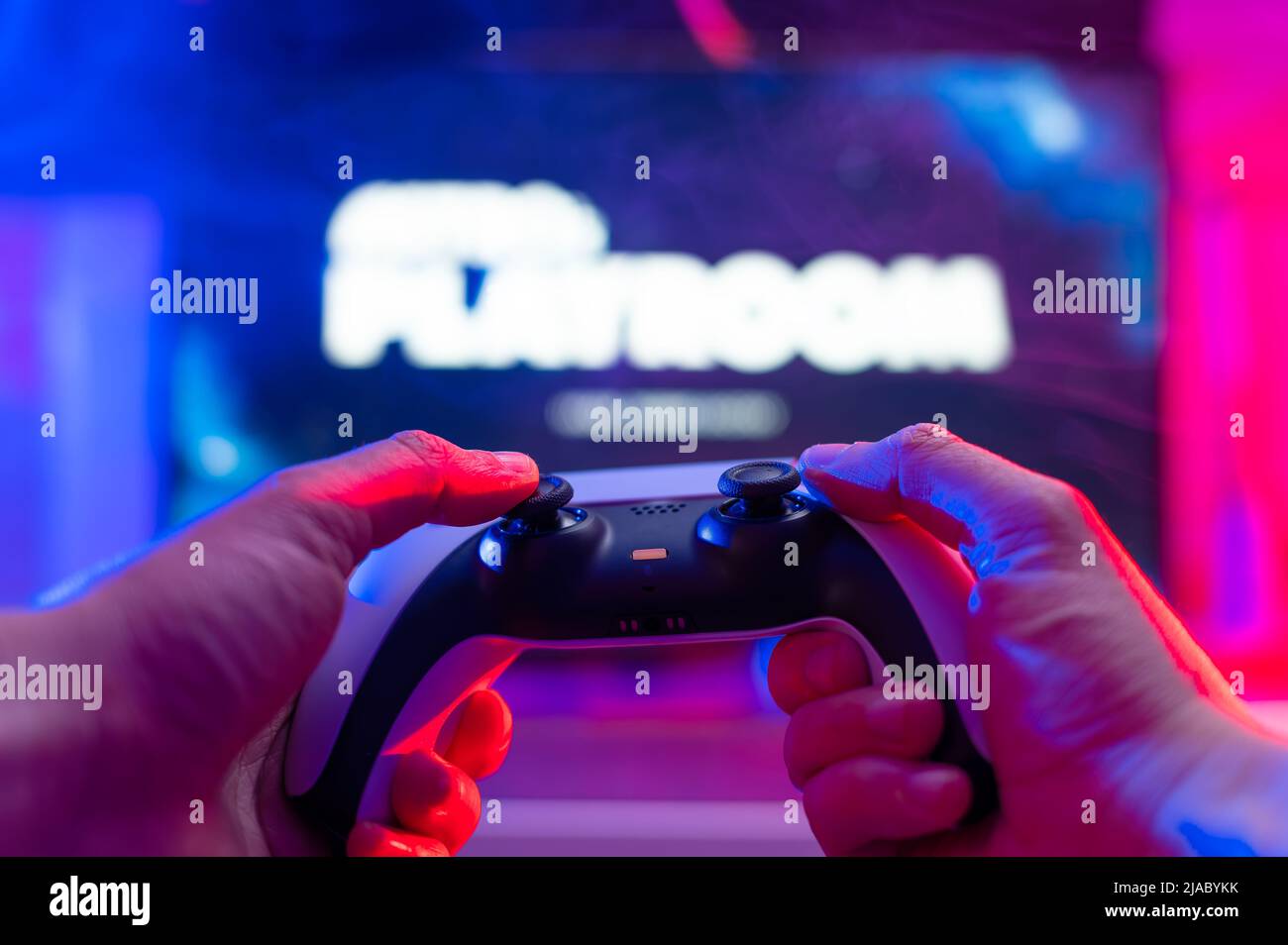 Gamepad, joystick in human hands on a technological background. Video ...