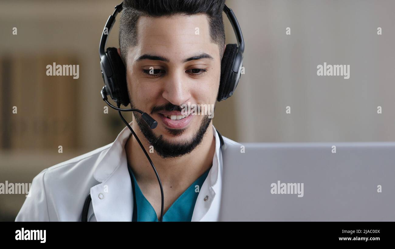 Professional male arab hispanic young doctor assistant in medical coat ...