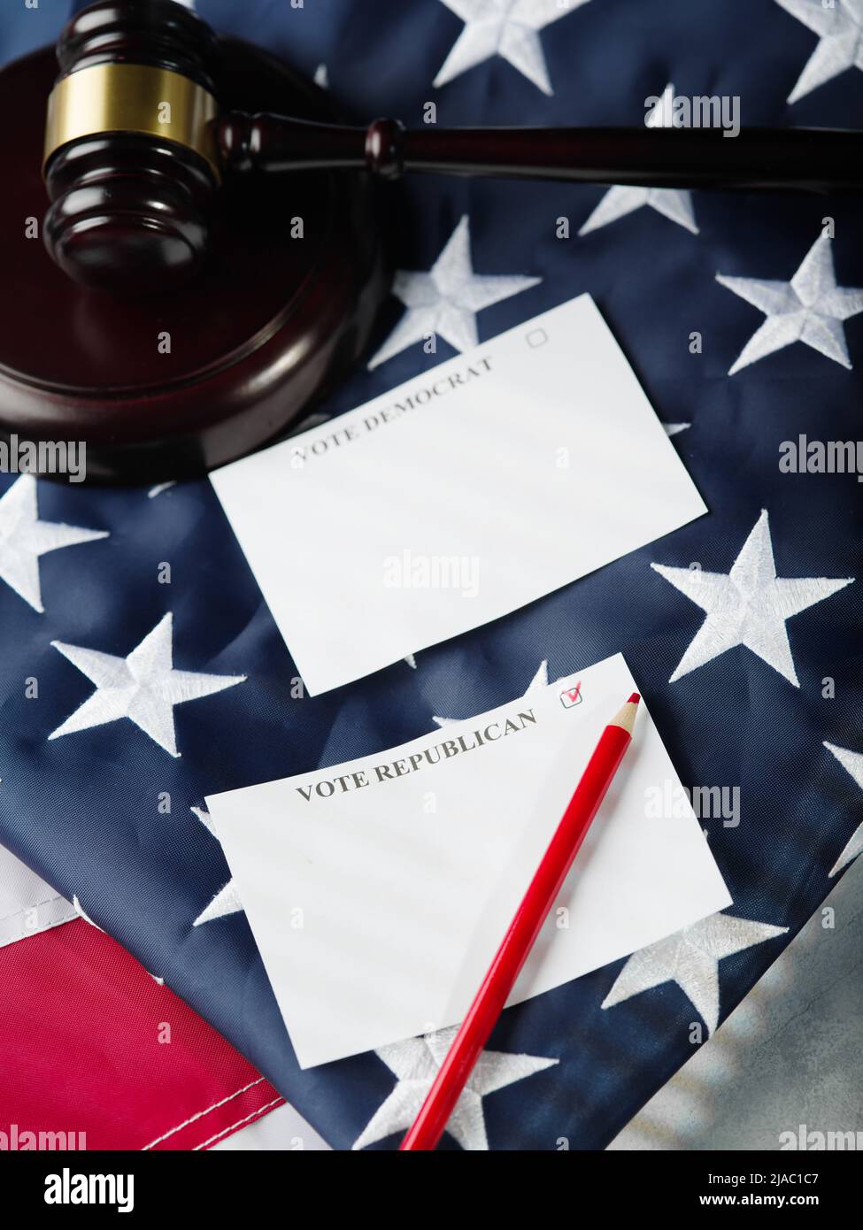Two ballot papers - vote democrat, vote republican, judicial wooden ...