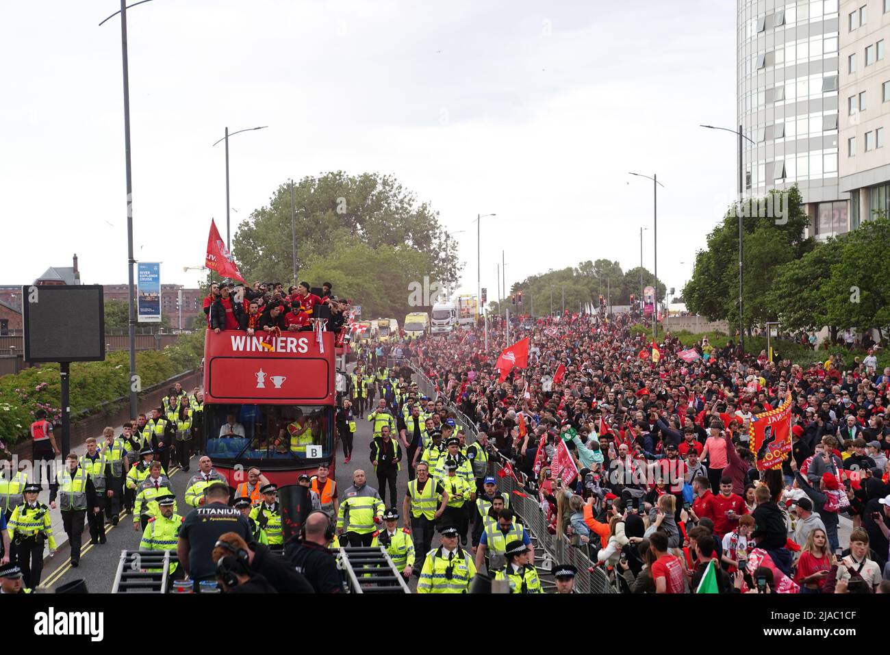 Liverpool players on an open-top bus during the trophy parade in ...