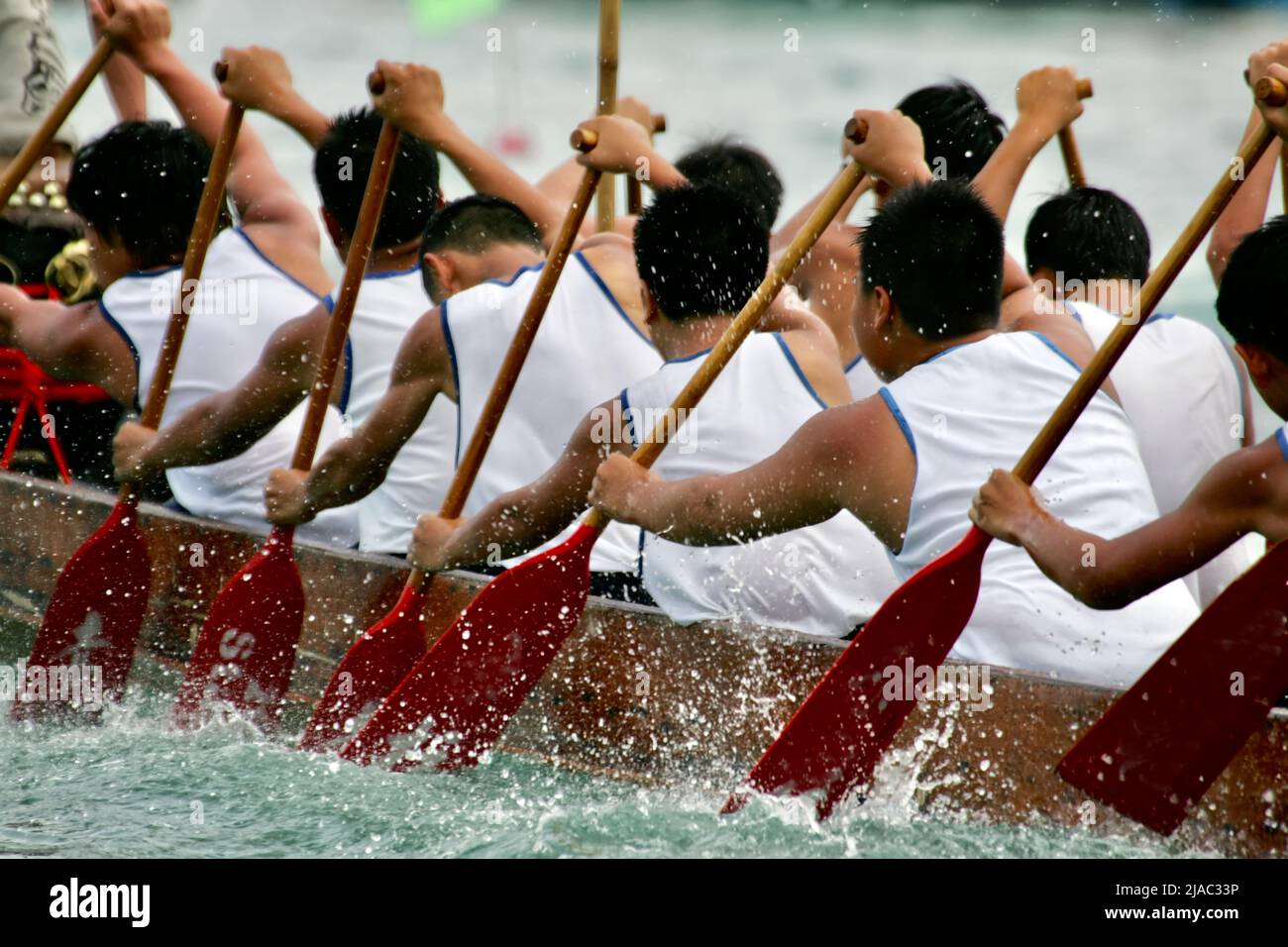 crew of a dragon boat Stock Photo - Alamy