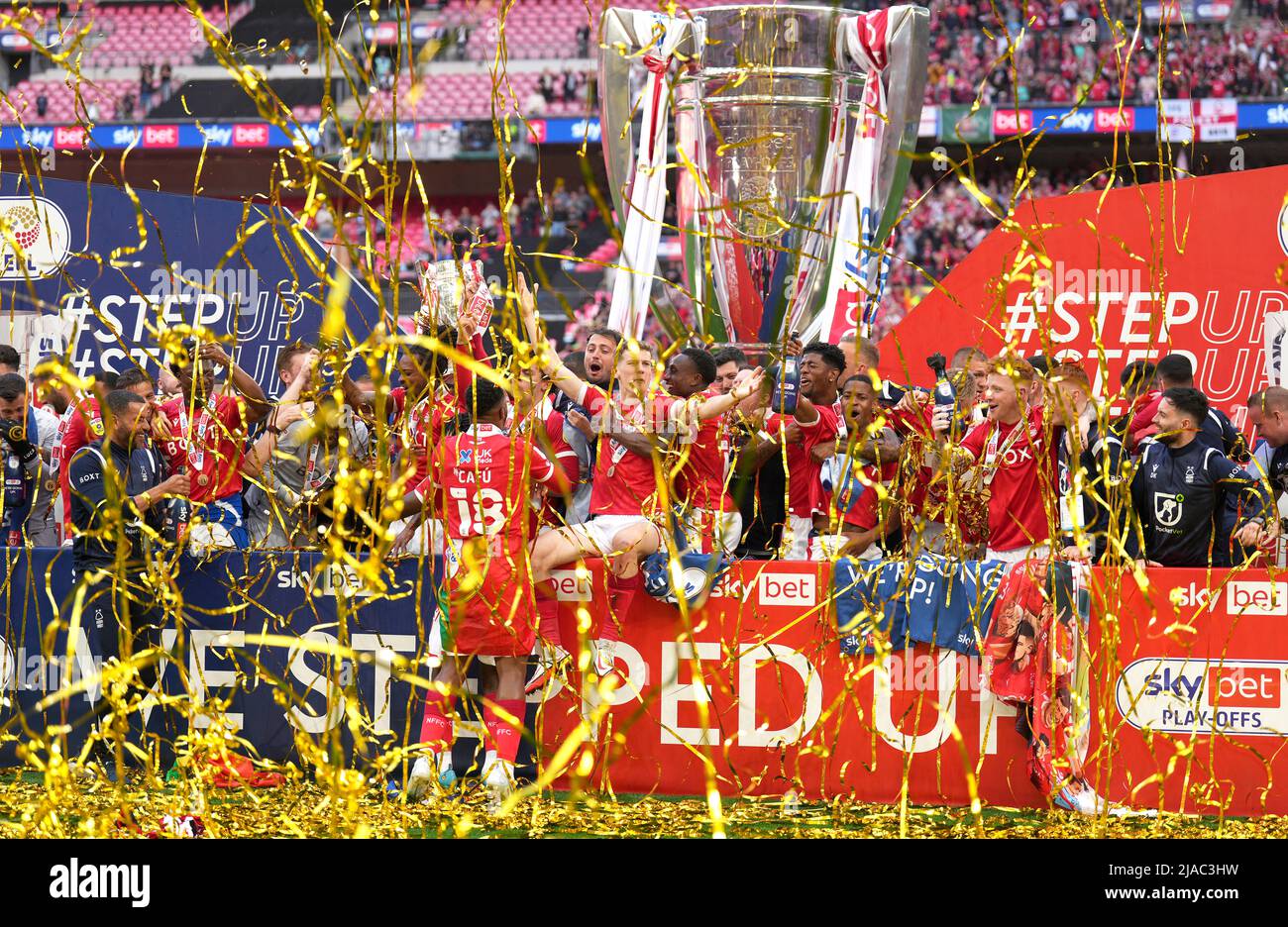 Nottingham Forest players celebrate with the trophy winning promotion ...