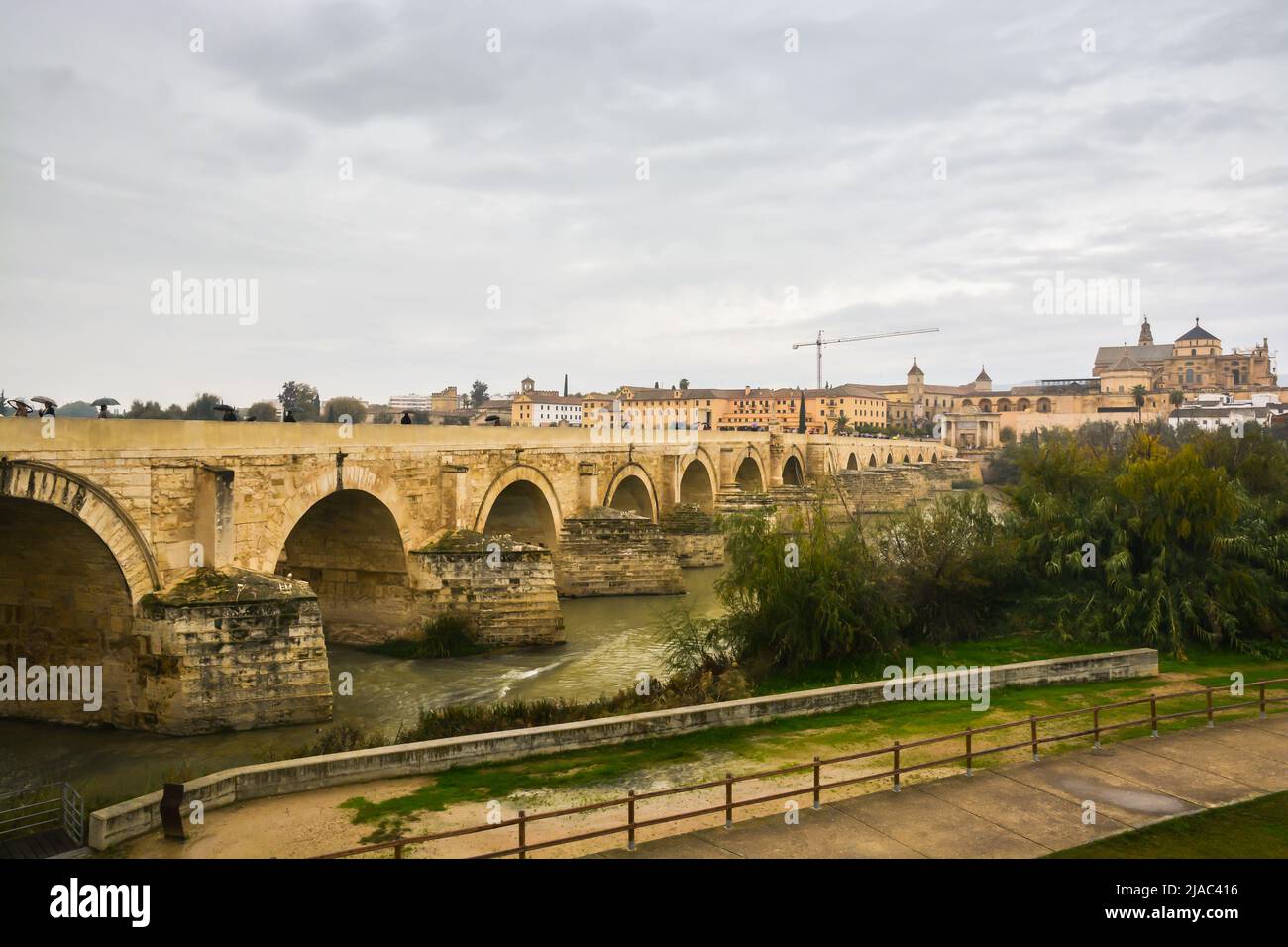 The Roman bridge in Cordoba over the Guadalquivir river. The bridge in ...