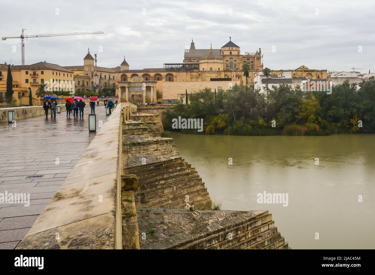 The Roman bridge in Cordoba over the Guadalquivir river. The bridge in ...