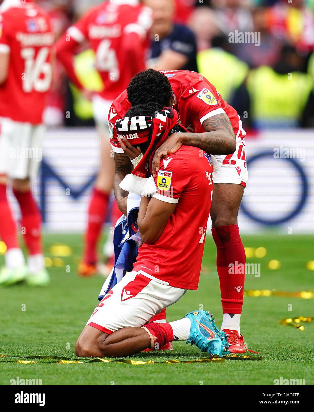 Nottingham Forest's Djed Spence (left) and Jonathan Panzo celebrate after winning promotion to ...