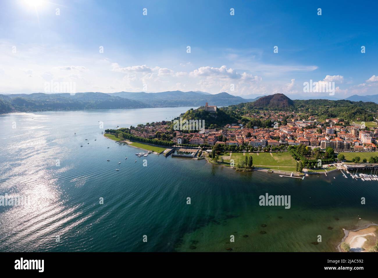 View of the town of Angera and its fortress called Rocca di Angera on a ...