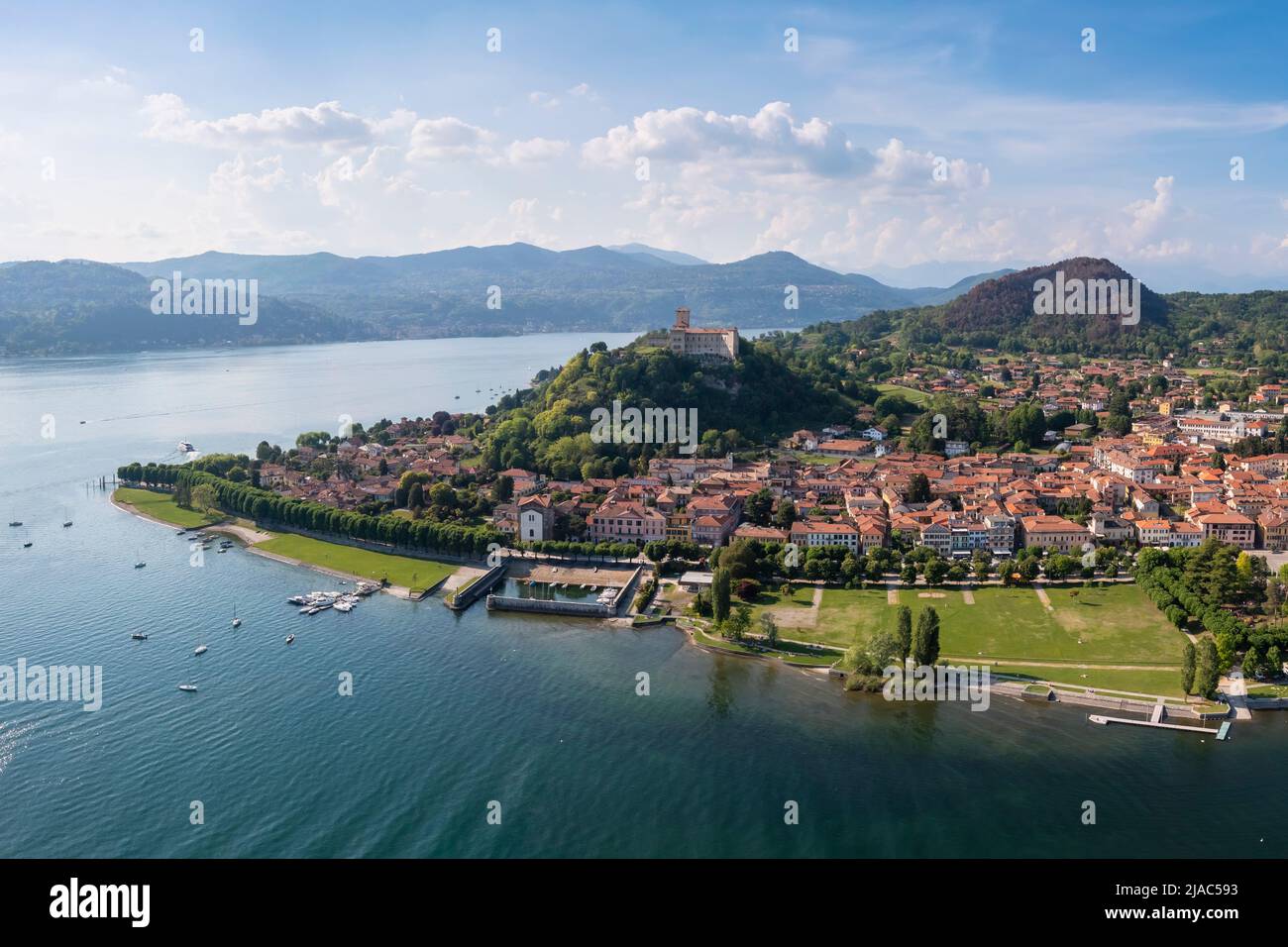 View of the town of Angera and its fortress called Rocca di Angera on a ...