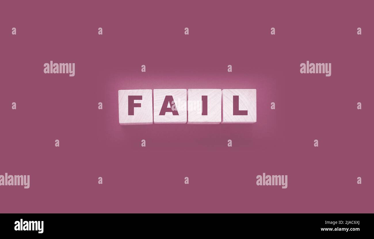 FAIL Word text Written In Wooden Cube blocks on black background ...