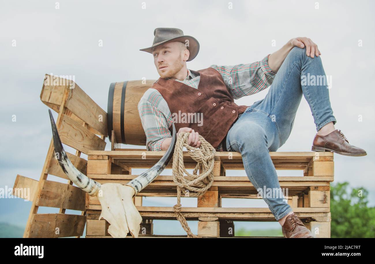 Cowboy wearing hat. Western life. Handsome bearded west farmer ...