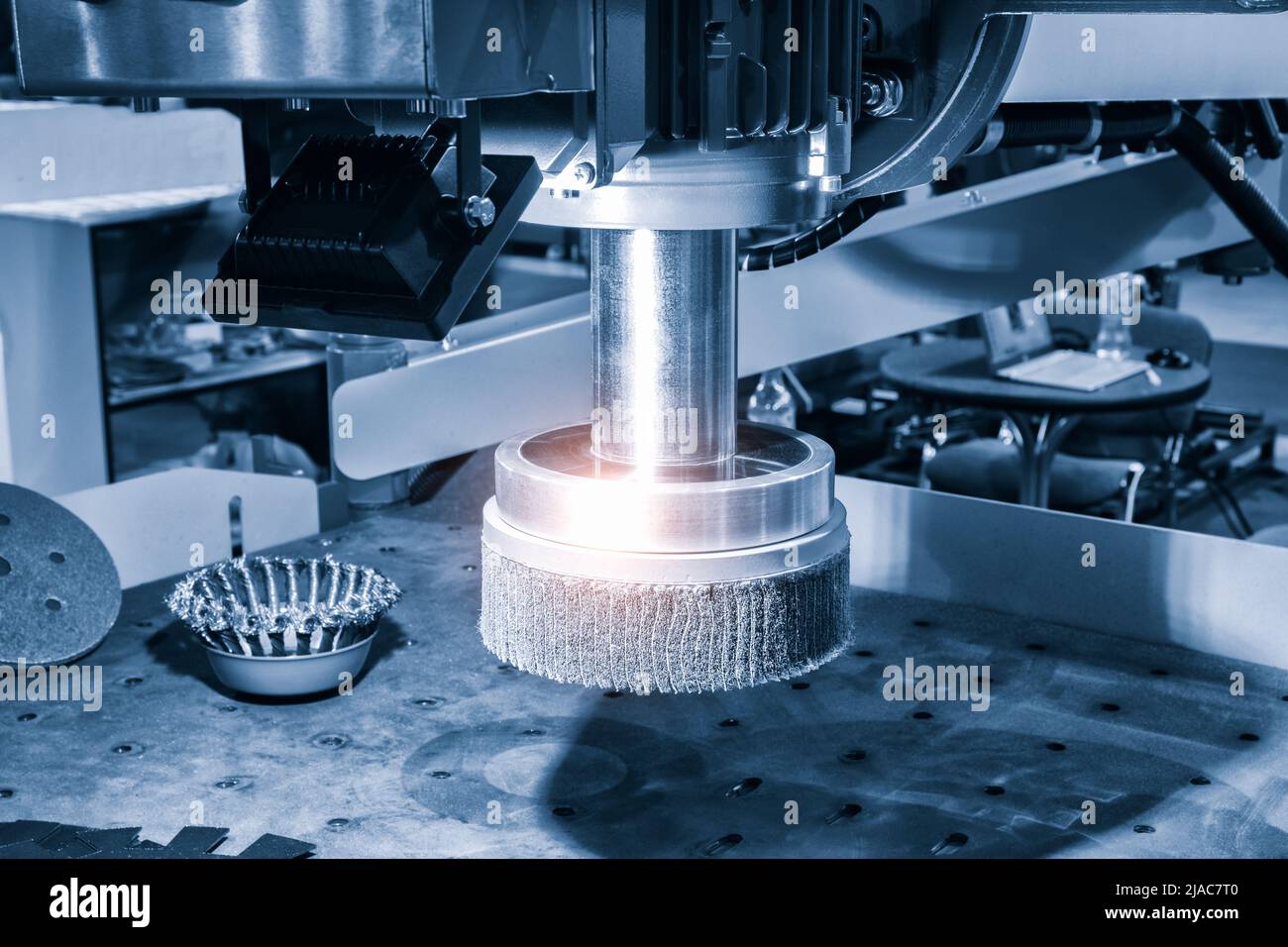 Manufacturing CNC professional abrasive treatment disc grinder machine, Close-up, industrial ...