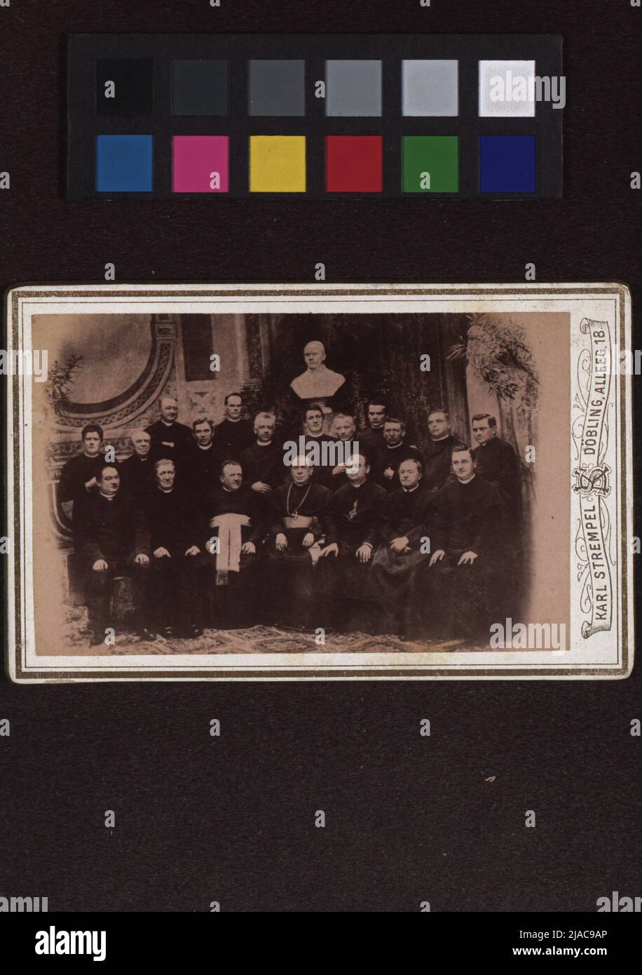 Group portrait 19 clergymen under the bust of the Pope (). Karl ...