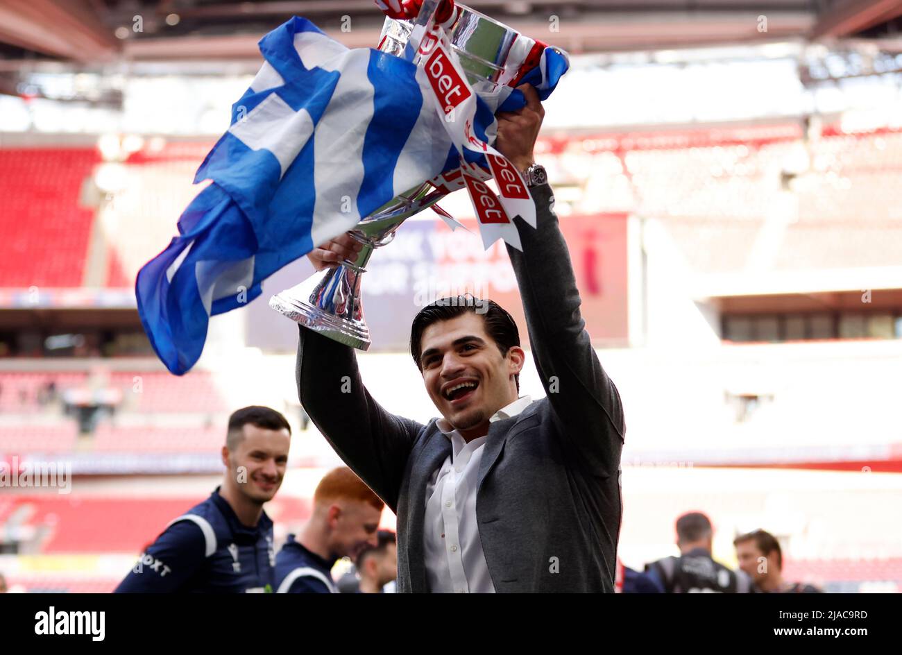 Miltiadis Marinakis lifts the trophy and celebrates promotion to the ...