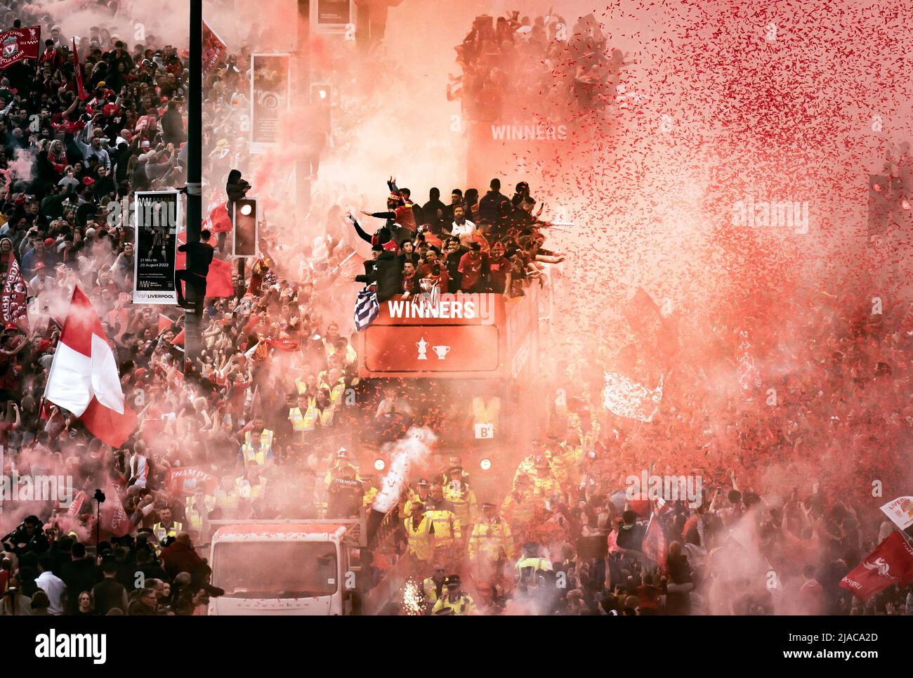 Liverpool players on an open-top bus during the trophy parade in ...