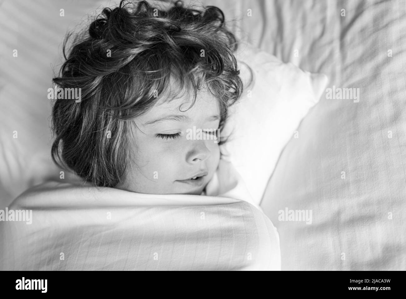 Cute sleeping kids in bed. Sleep kids Stock Photo - Alamy