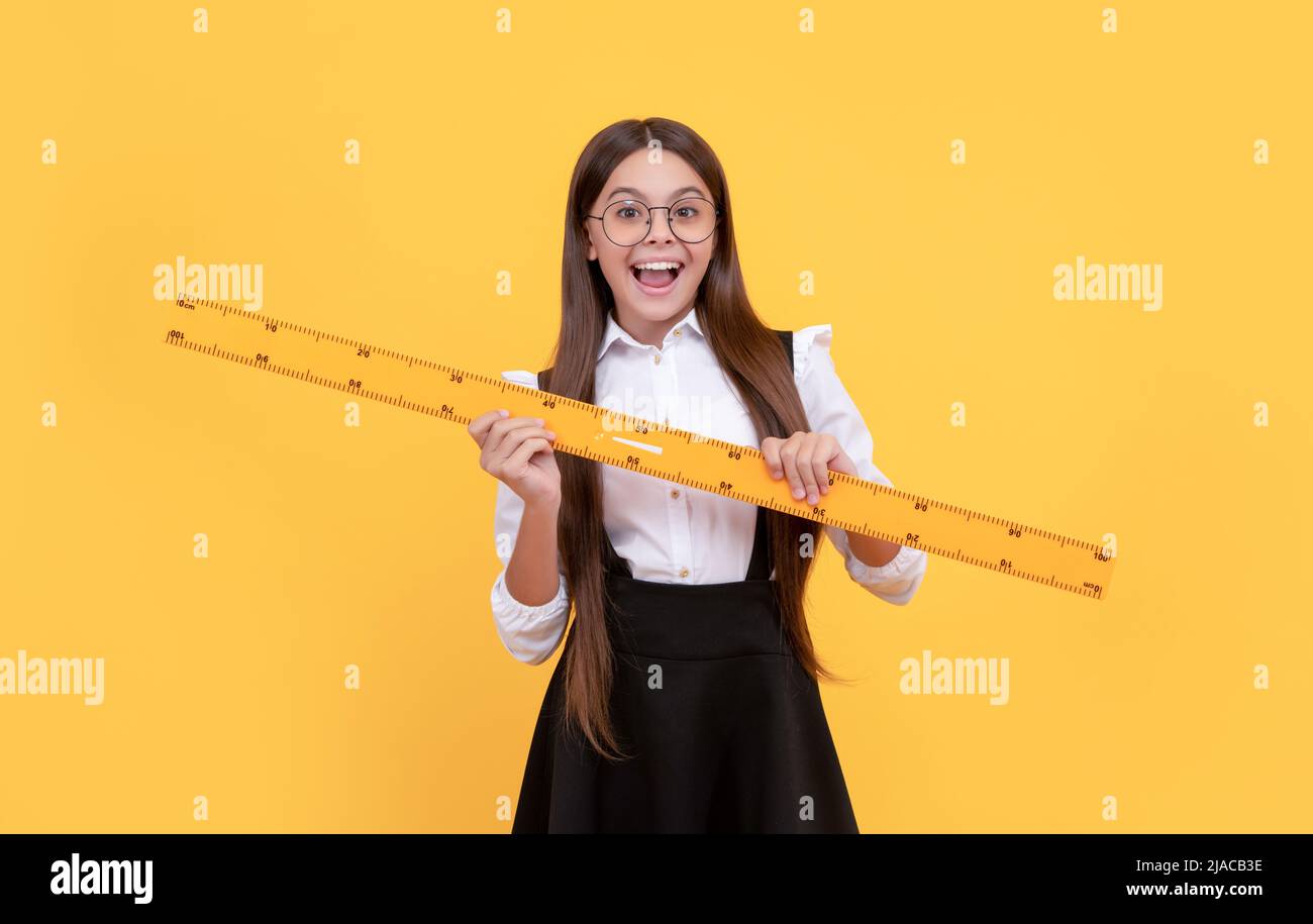 happy mathematics. tween girl hold ruler. back to school. algebra and ...