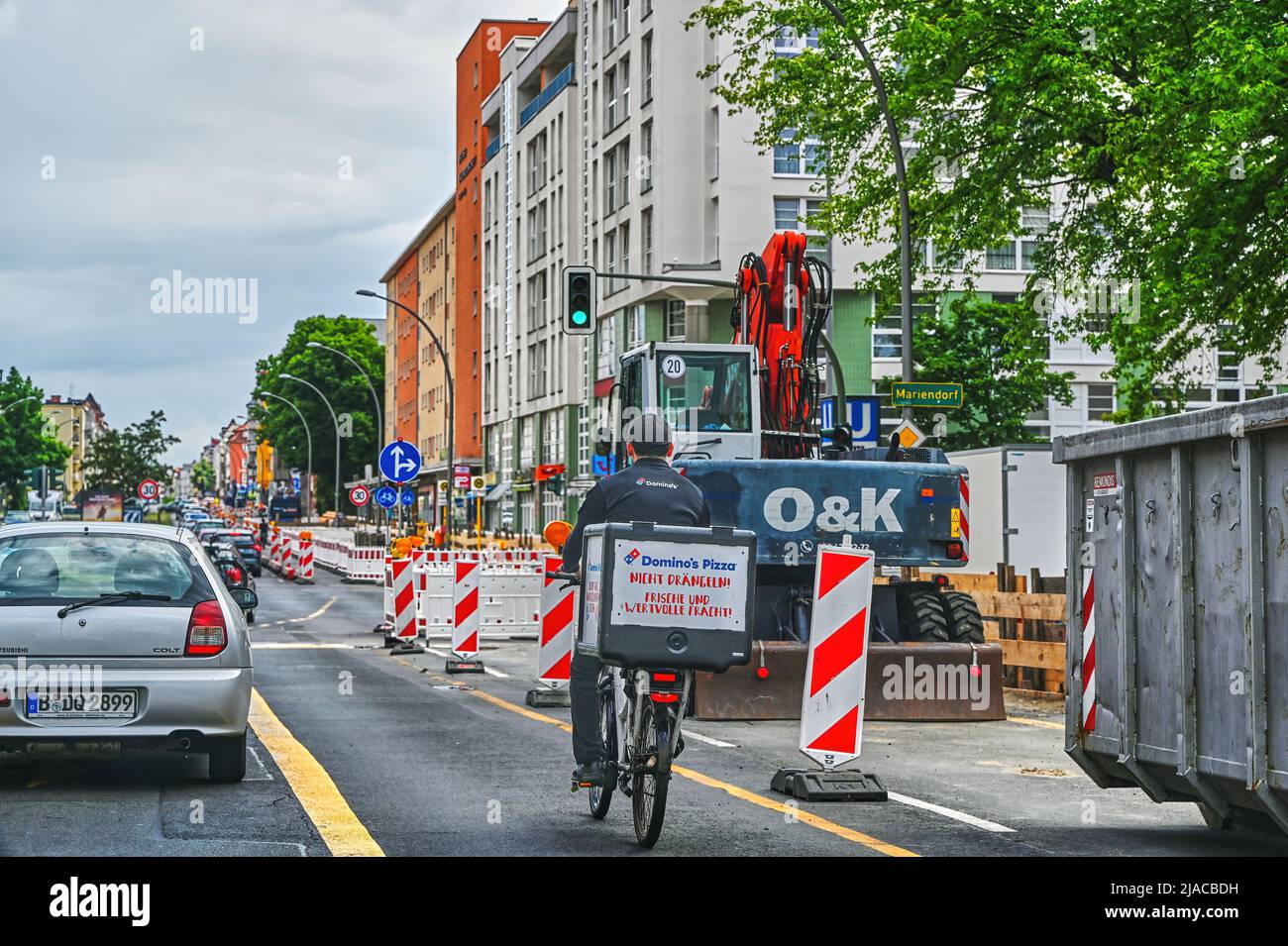 Berlin, Germany - May 29, 2022: Cyclist in a dedicated cycle lane on a ...