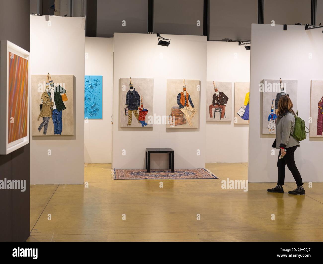 Woman Walking and Admiring Paintings in a Modern Art Gallery Stock ...