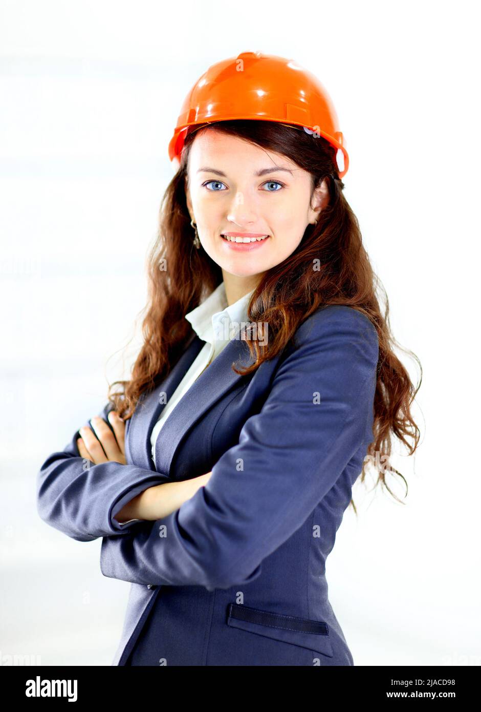 The beautiful business woman the engineer on a white background Stock ...