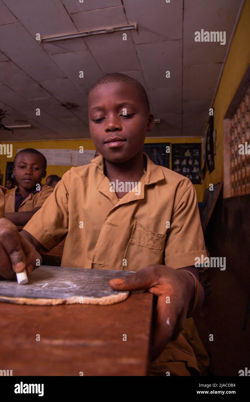 Child blackboard chalk write writing hi-res stock photography and ...