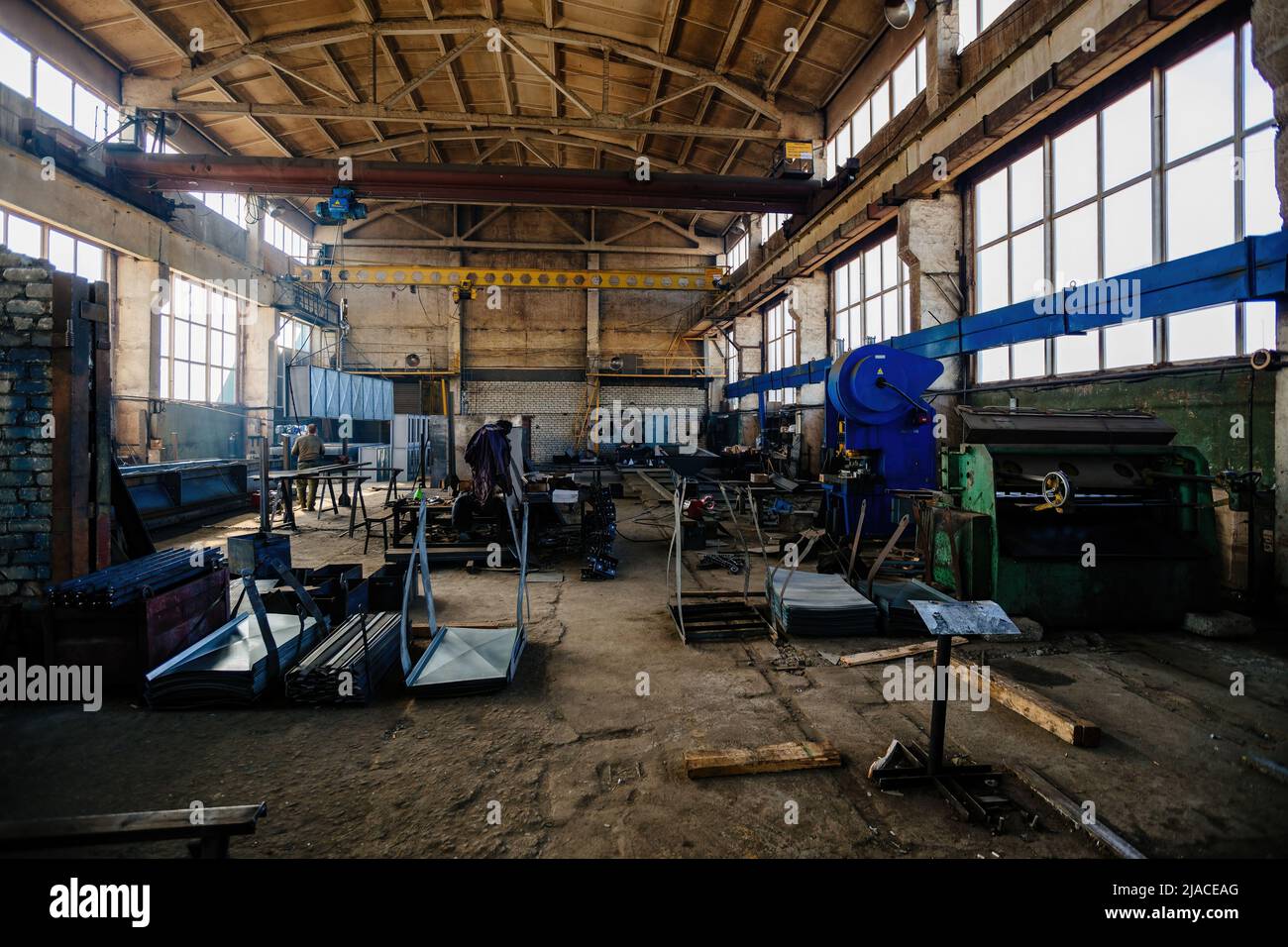 Metalworking factory production line. Manufactured metal parts Stock ...