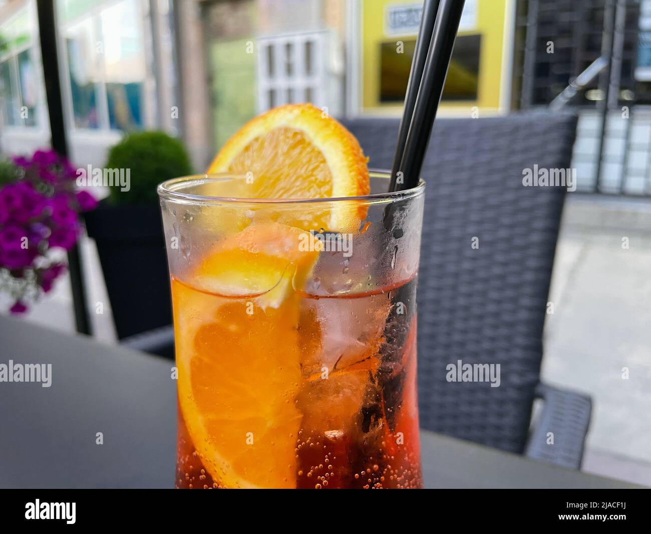 Aperol spritz with orange slice at outside cafe Aperol is an Italian ...