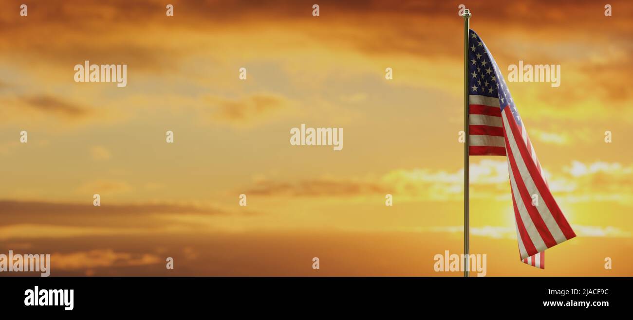 US flag waving on flagpole, sunset or sunrise sky background, banner ...