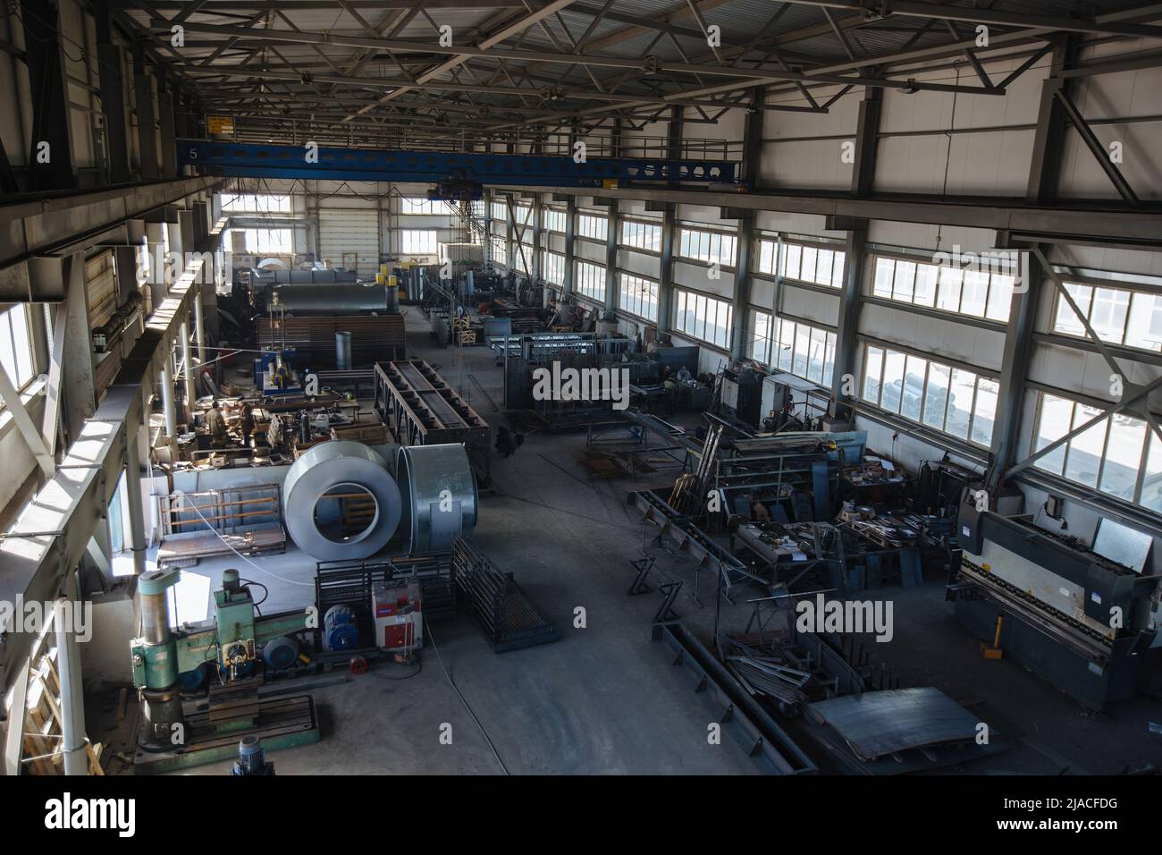 Metalworking factory production line. Manufactured metal parts Stock ...