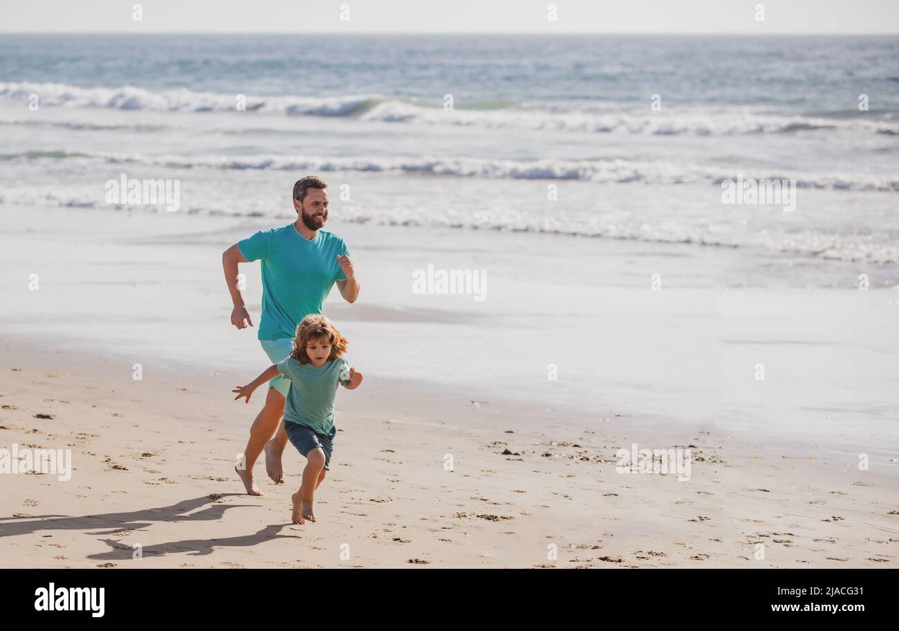 Father and son running on beach. Sport and healthy lifestyle, family ...