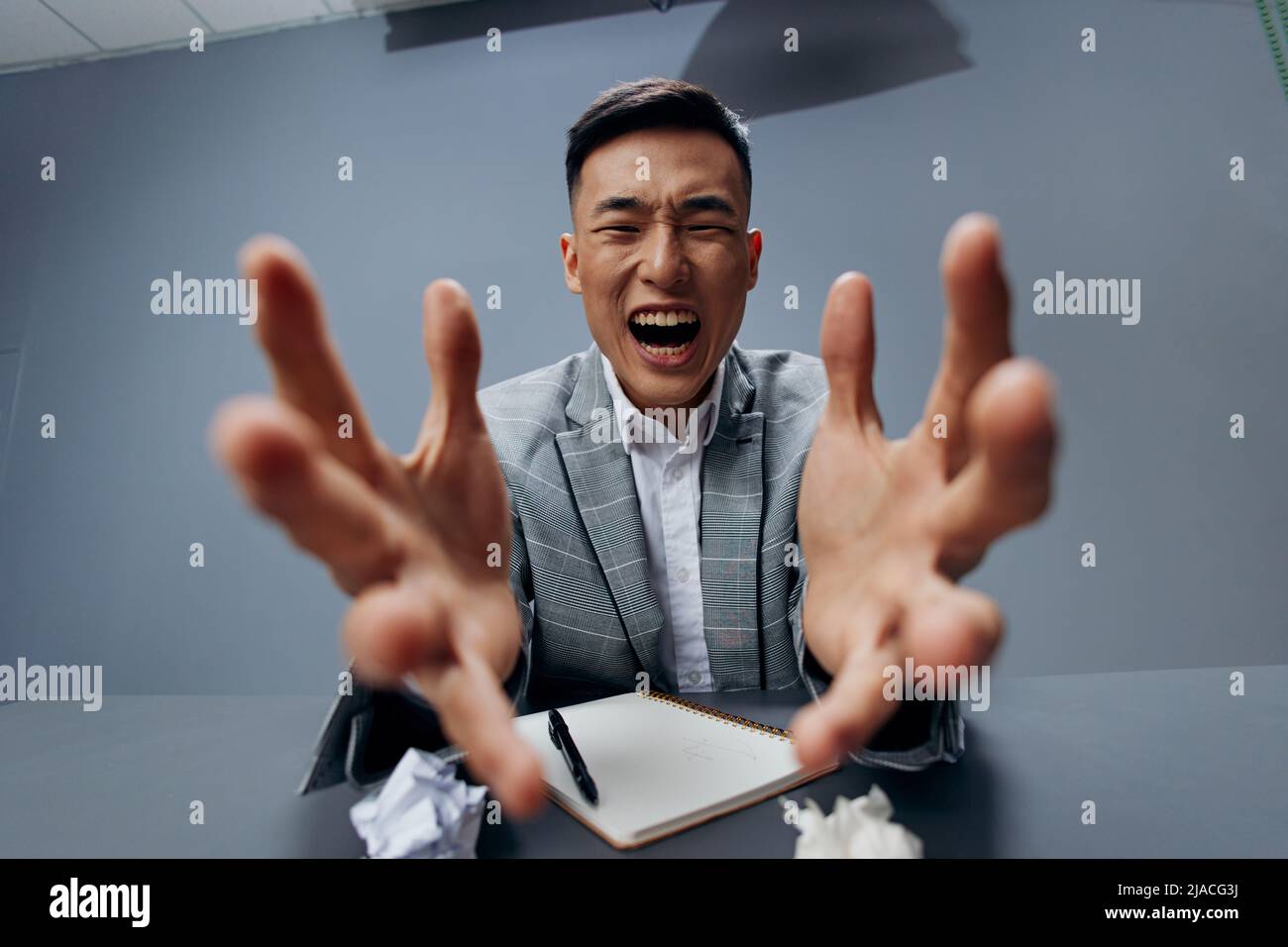 manager sits in the office emotions nervous breakdown anger executive ...