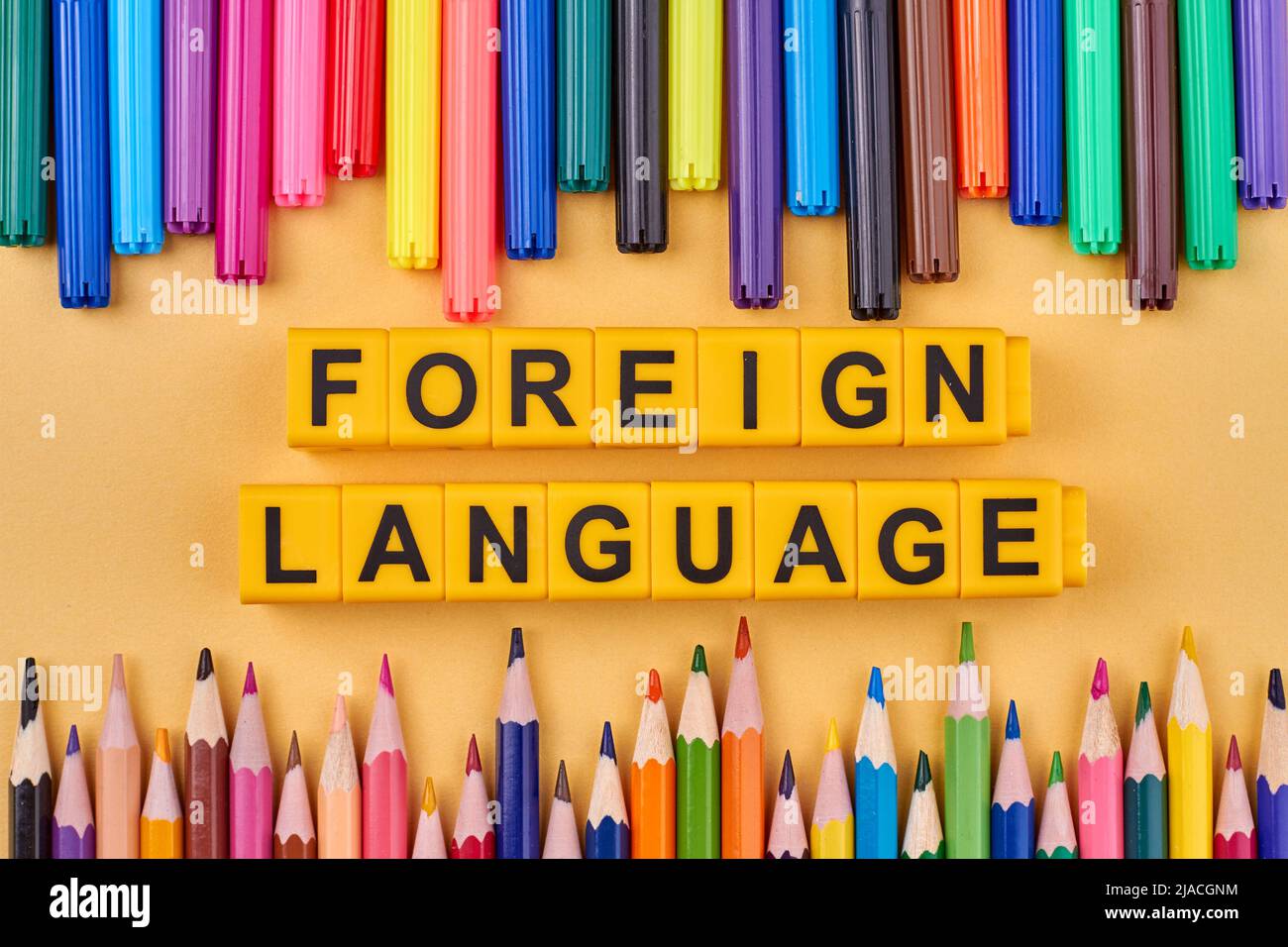 Frame from colorful pencils and inscription FOREIGHN LANGUAGE written ...
