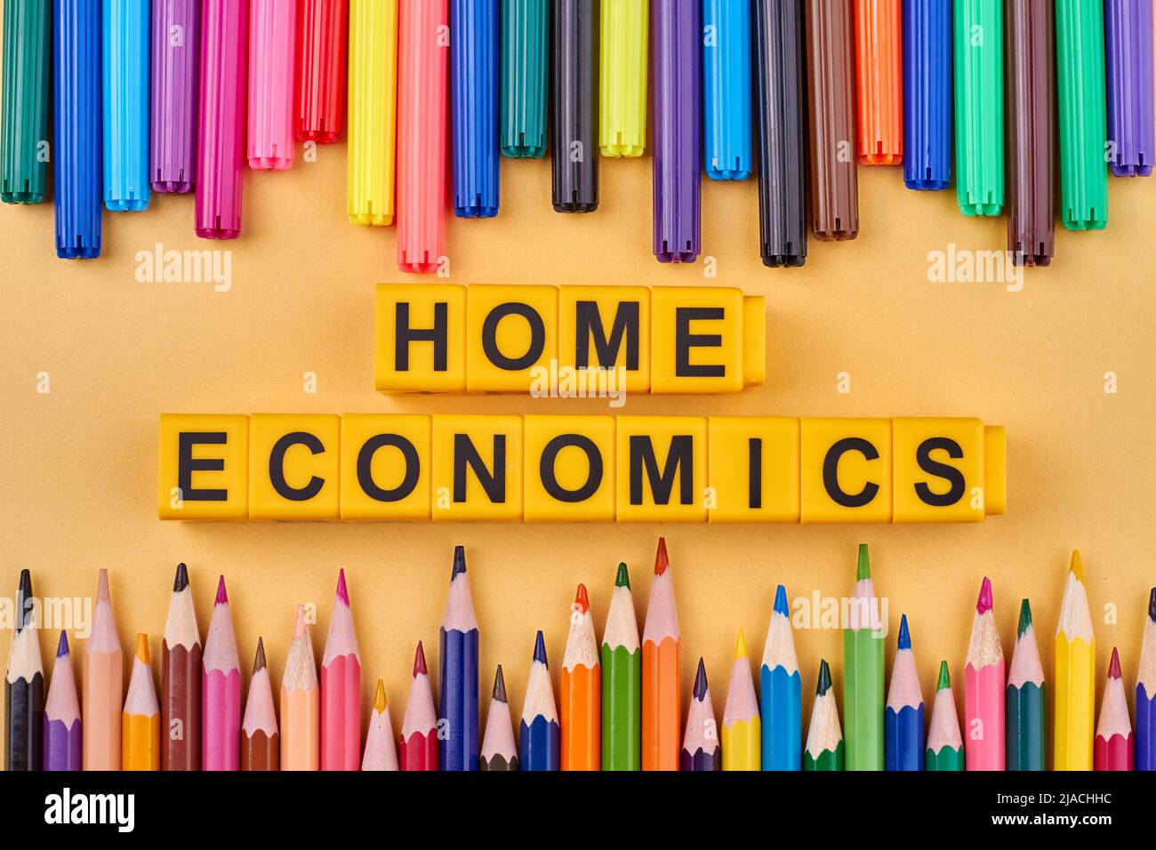 Home economics inscription made from color cubes. Flat lay composition ...