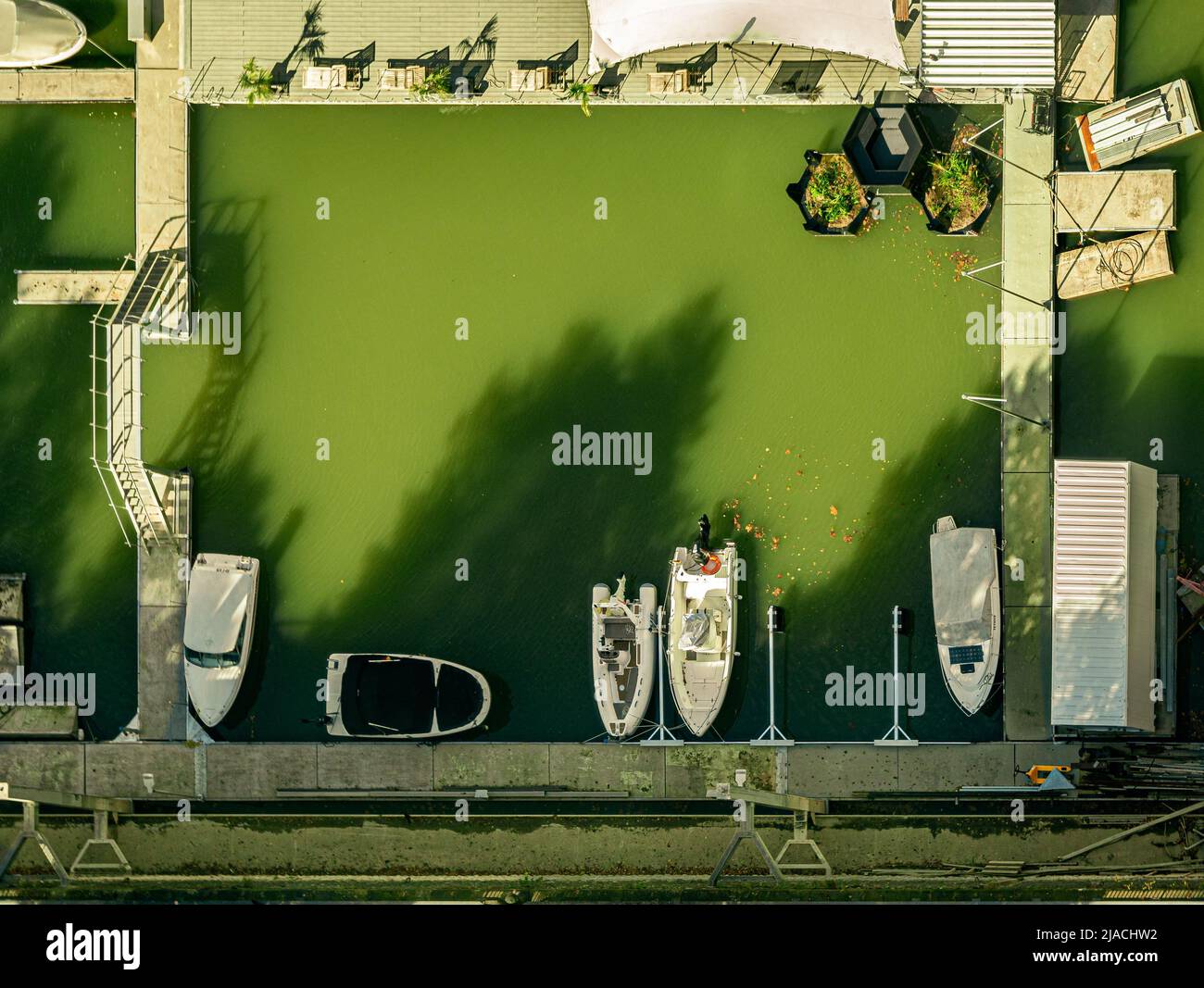 Aerial view of ships in small harbor Stock Photo - Alamy