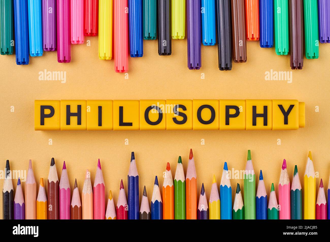 Word philosophy written on yellow cubes in frame made from colorful ...