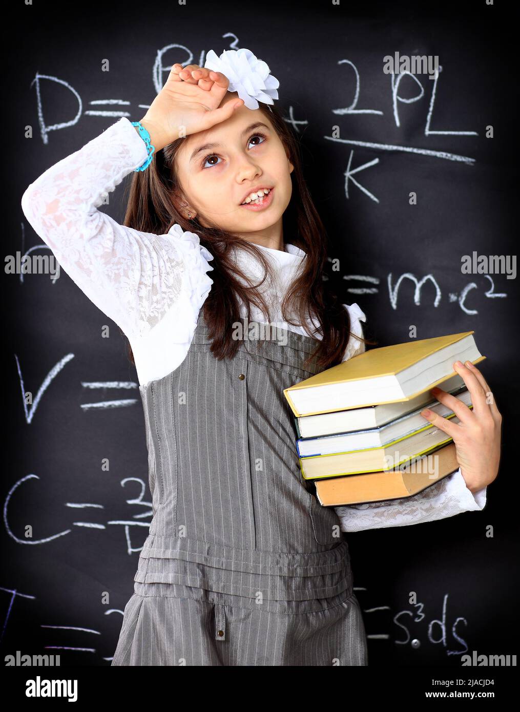 The little girl decides to mathematical equations Stock Photo - Alamy