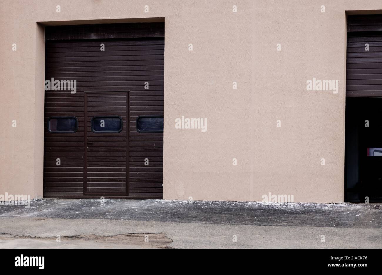 old warehouse building with entrance. loading door Stock Photo - Alamy
