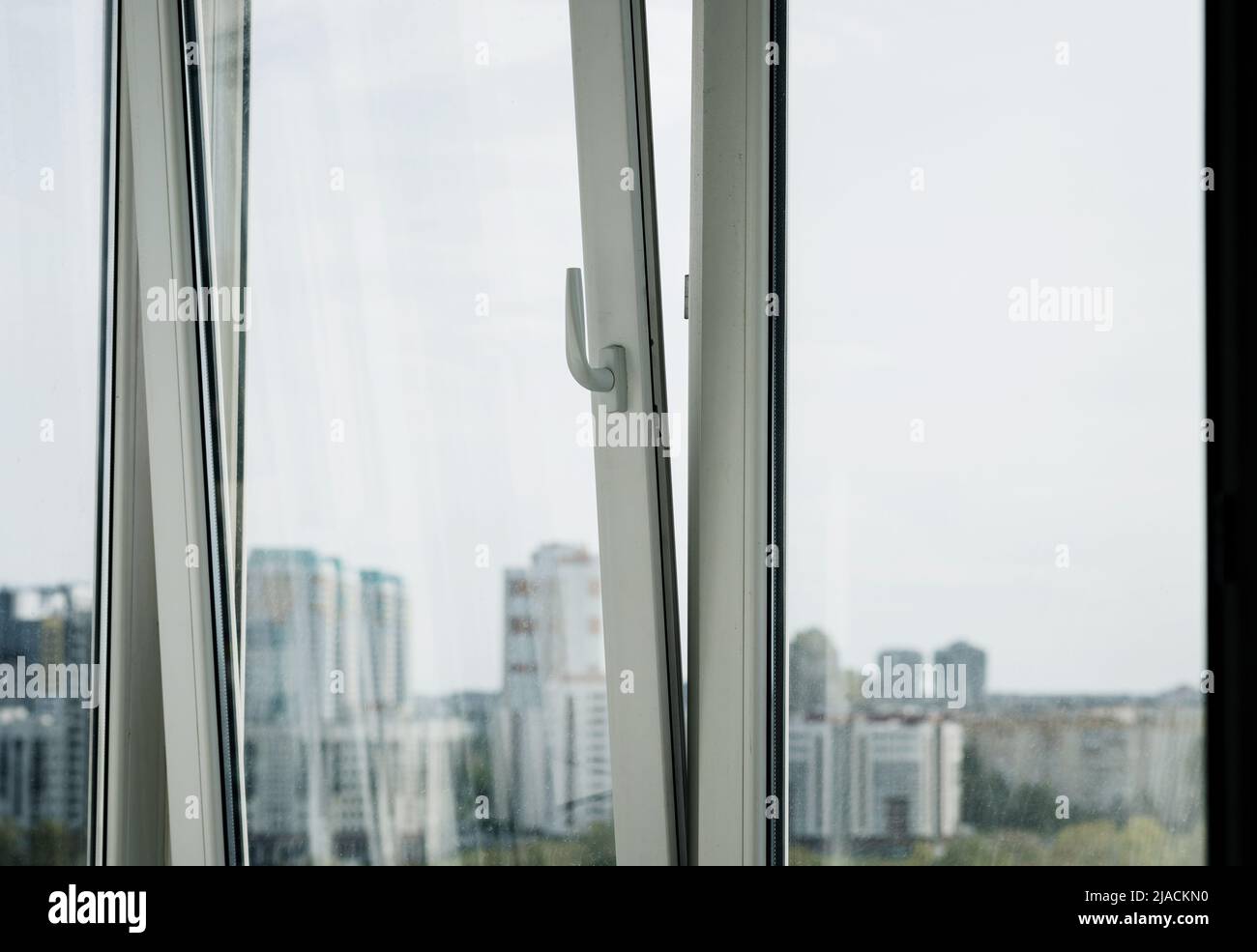 open plastic window in room. White metal-plastic windows Stock Photo ...
