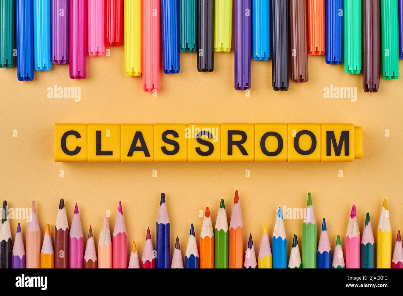 The word classroom written on yellow cubes. School education concept ...