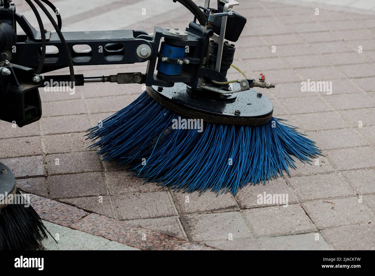 industrial sidewalk cleaning. Brushs of street cleaning machine Stock ...