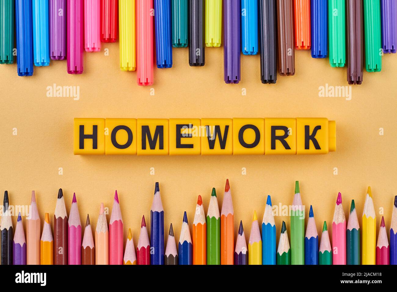 Flat lay composition with homework inscription on cubes and colorful ...