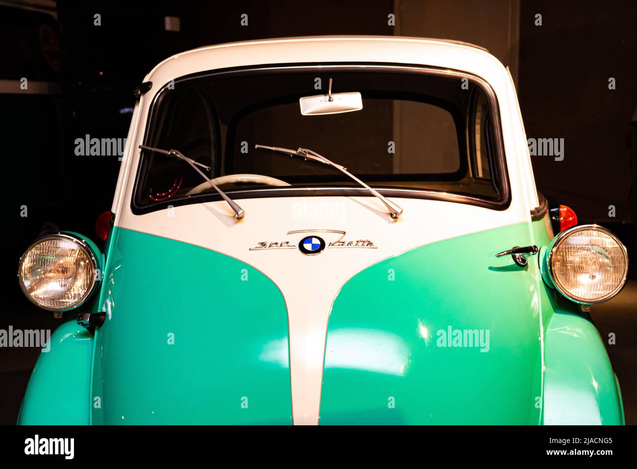 BMW Isetta and a Minivan Retro car stands in an exhibition at museum ...