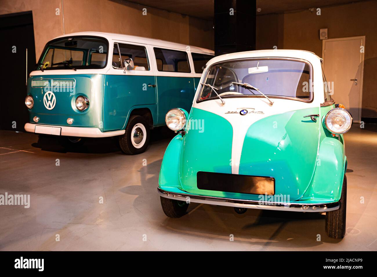 BMW Isetta and a Minivan Retro car stands in an exhibition at museum ...