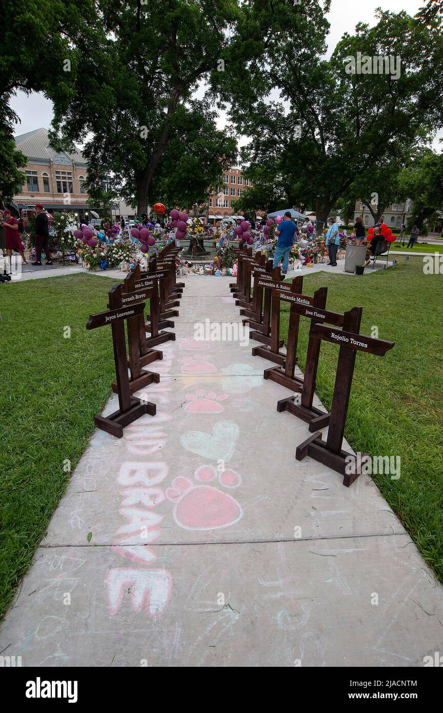 May 29, 2022: Crosses bear the names of the shooting victims in the ...
