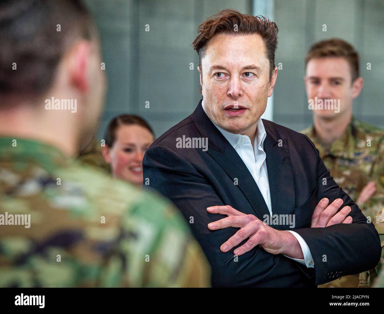 Elon Musk (third from left) talks with cadets in Mitchell Hall on ...