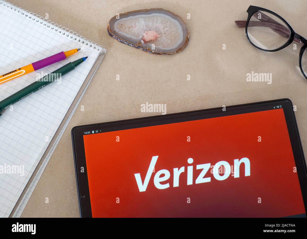 In this photo illustration, a Verizon Communications Inc. logo seen ...
