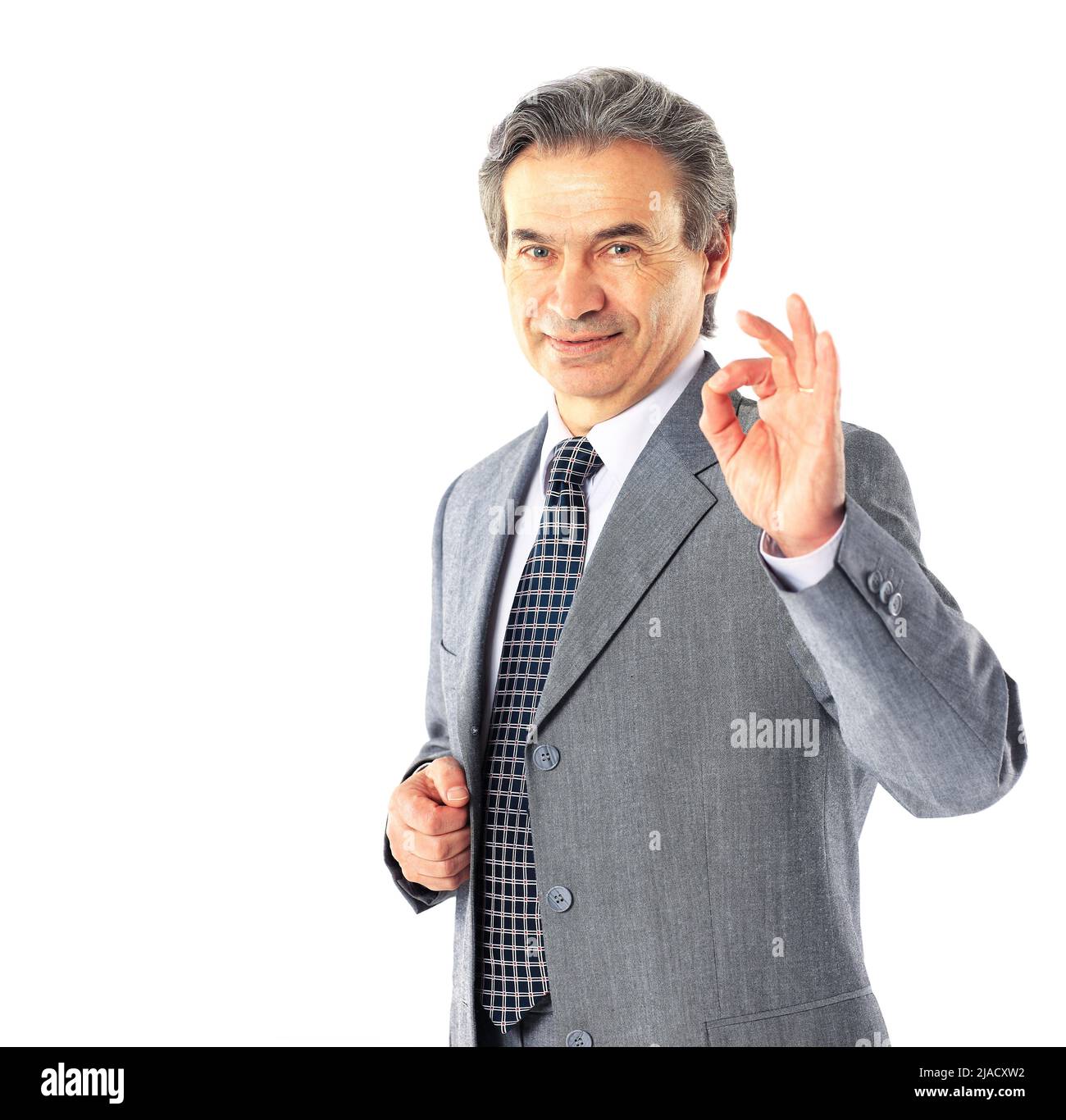 Mature businessman doing ok sign Stock Photo - Alamy