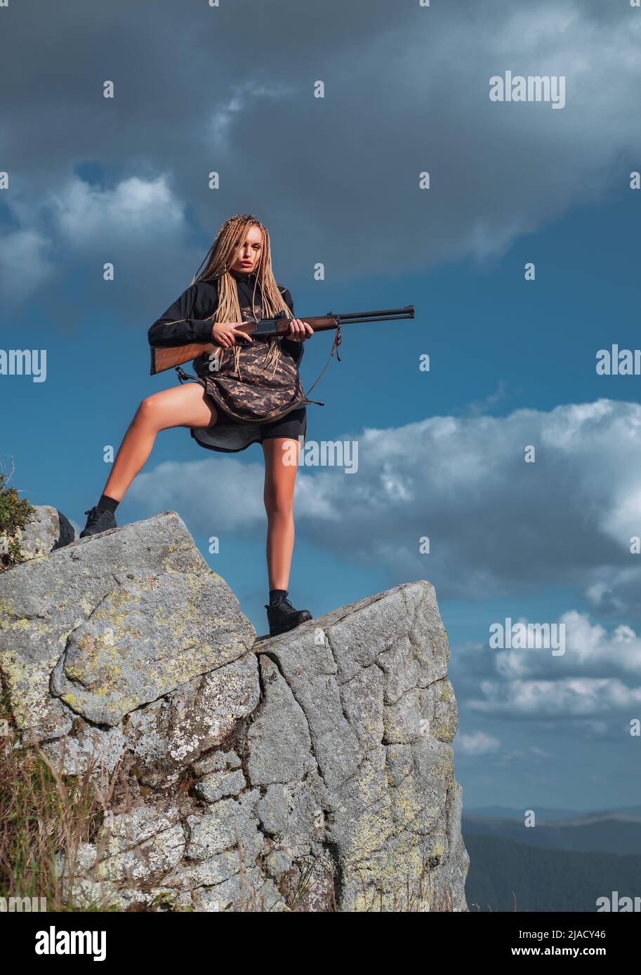 Young woman shooting hunting rifle hi-res stock photography and images ...